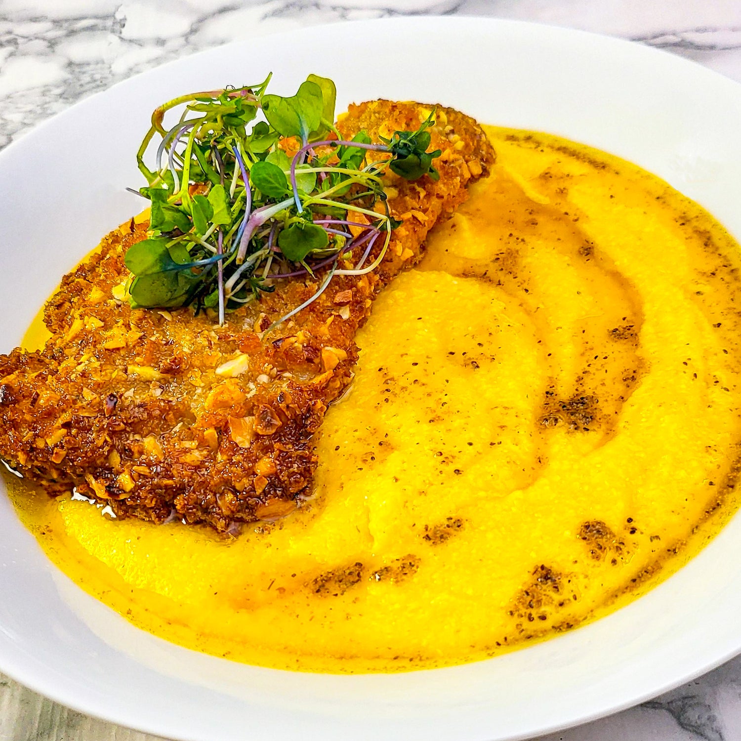 Almond-Crusted Cod with Orange Grits – Popsie Fish Co
